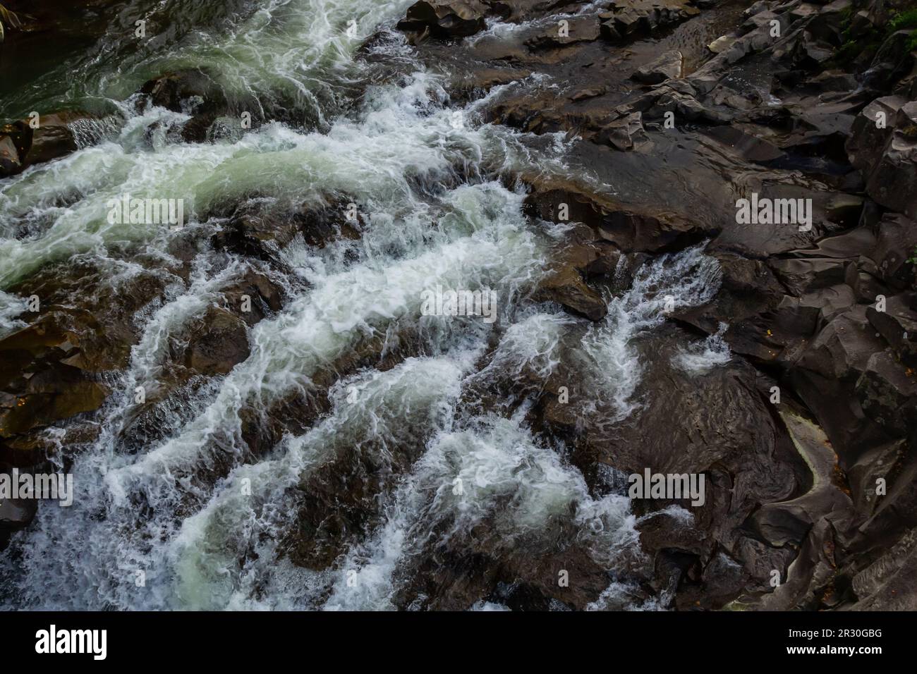 Stone over water, up close hi-res stock photography and images - Alamy
