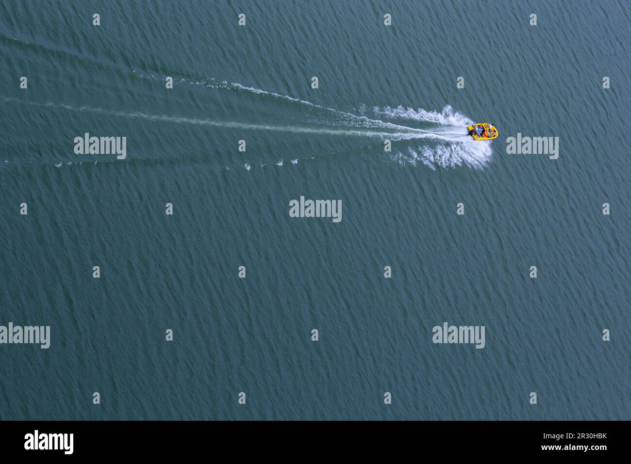 A top-down view of the speed of a motorboat sailing on water Stock ...