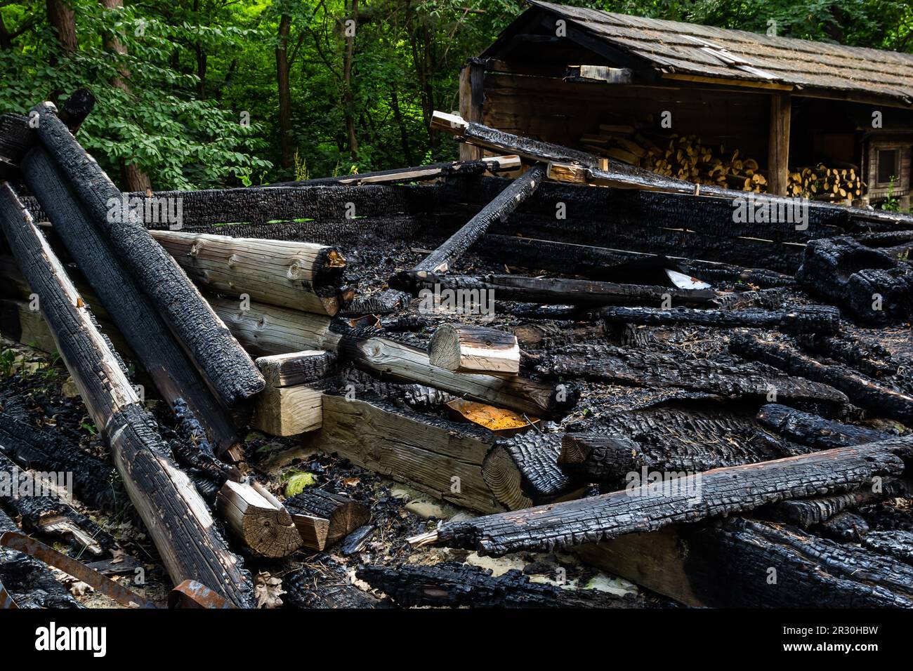 Destroyed by fire wooden house completely burned to the ground .ruins ...