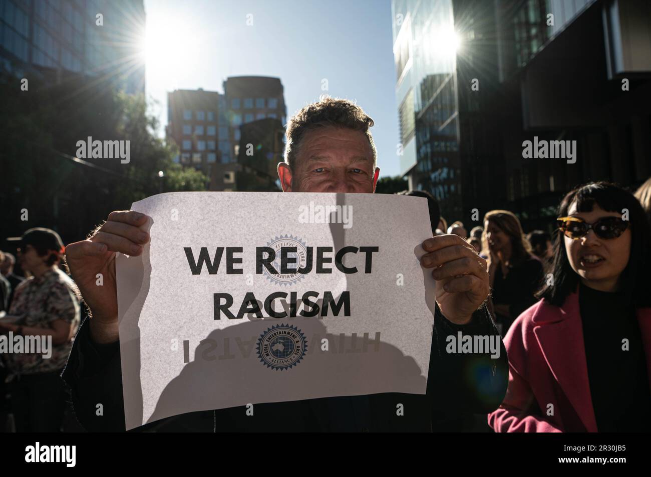 People participate in a rally in support of Former ABC Q&A Host Stan ...