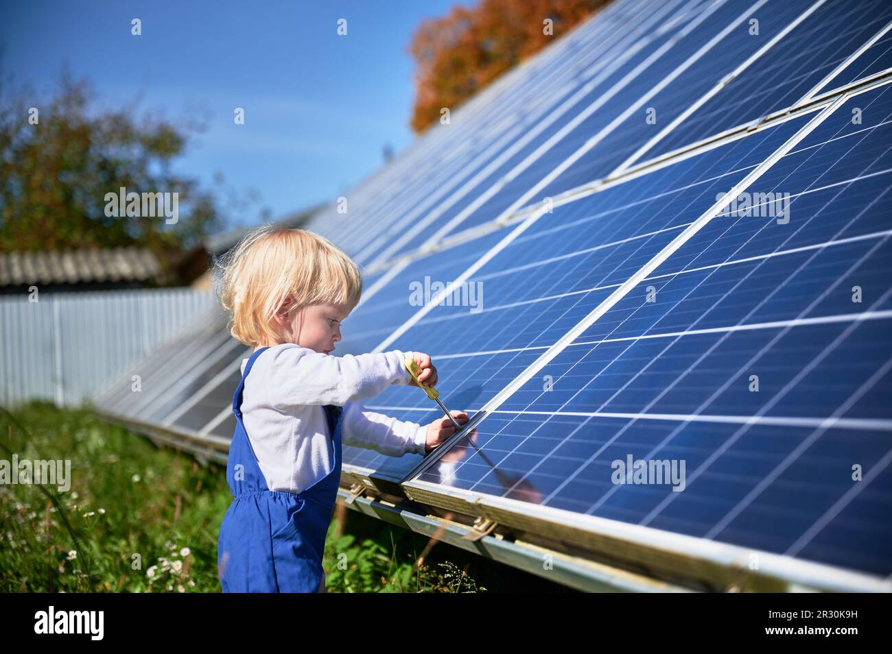 Boy learning how does solar panel work. Small kid interested in using ...