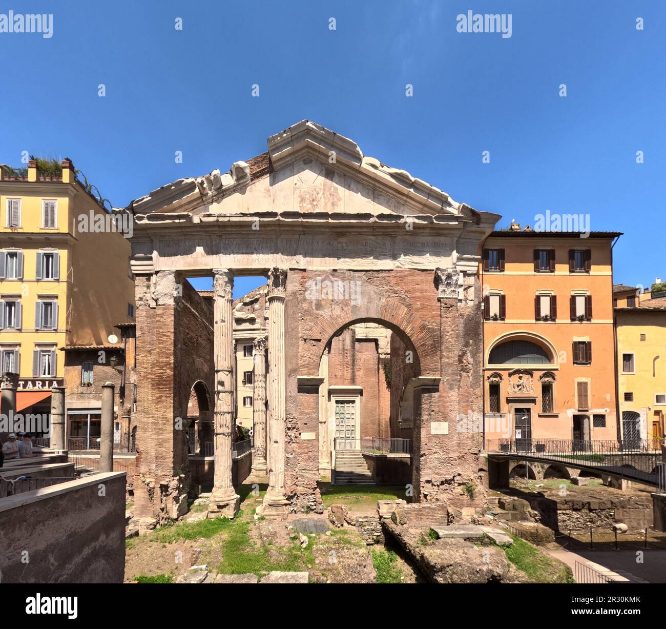 View of an ancient Roman temple in the historic center of the Italian ...
