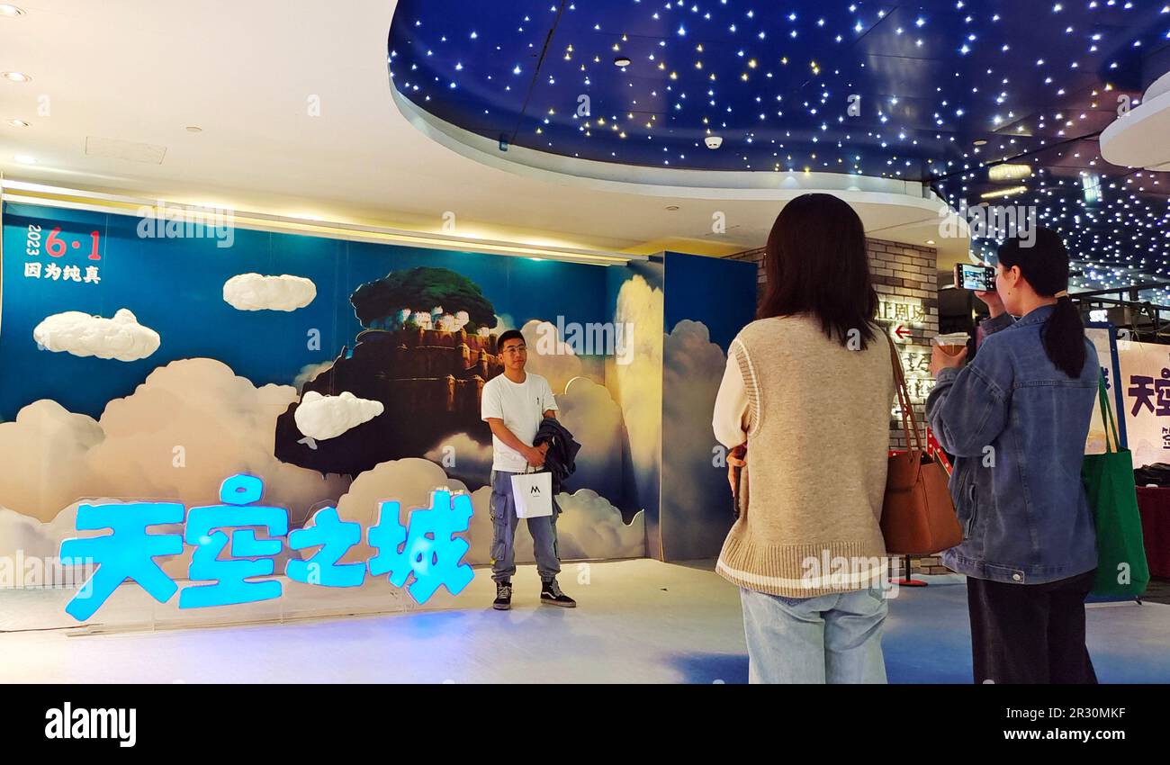 SHANGHAI, CHINA - MAY 21, 2023 - Citizens watch the classic animated ...