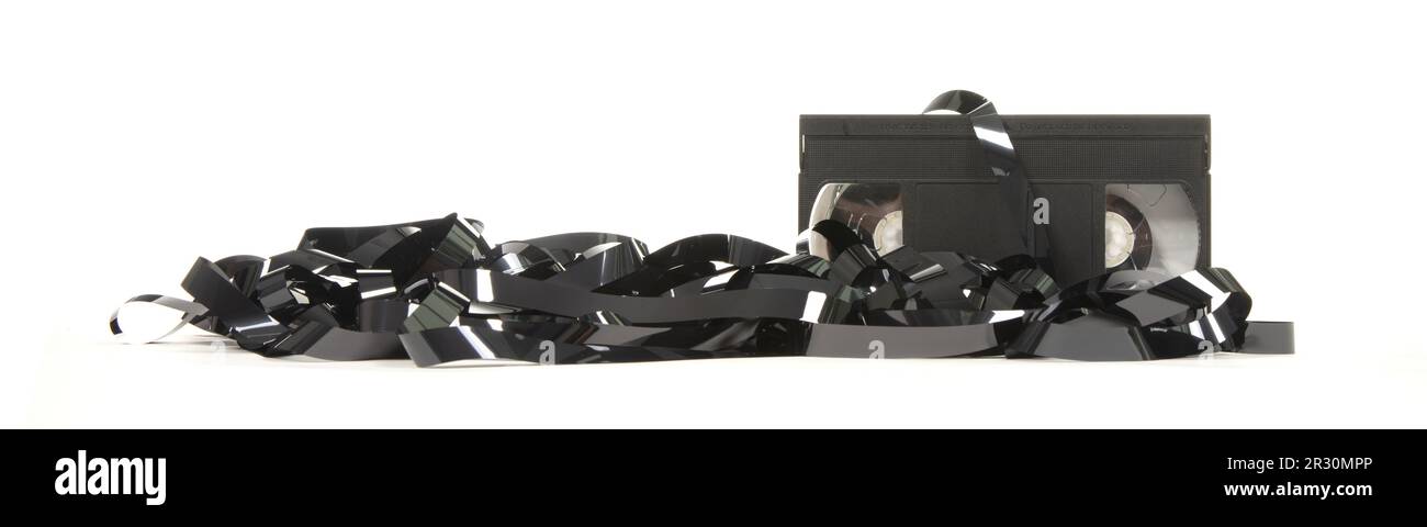 Broken video tape isolated on a white background Stock Photo - Alamy