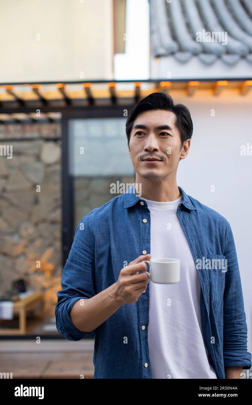 Village scene men drinking hi-res stock photography and images - Alamy