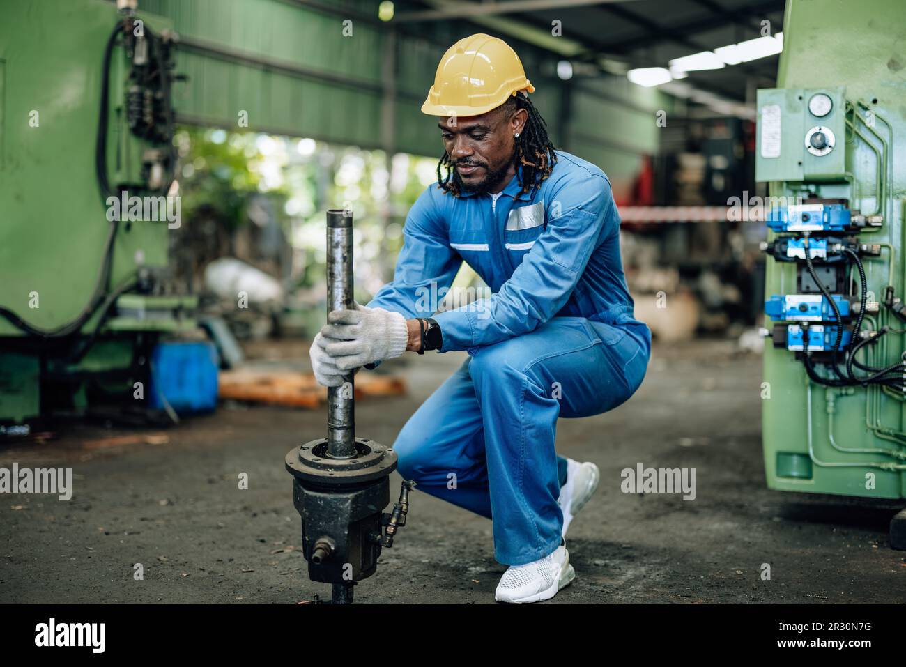 Engineering technicians use hand tools to perform regular maintenance ...