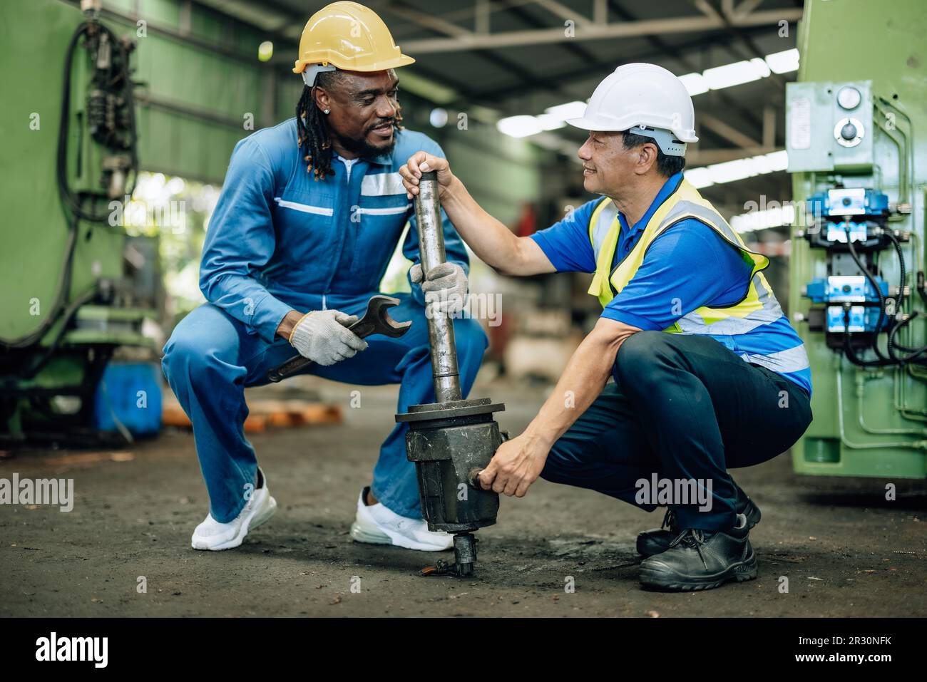 Engineering technicians use hand tools to perform regular maintenance ...