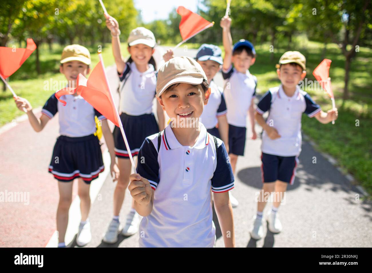 China school children flag hi-res stock photography and images - Alamy
