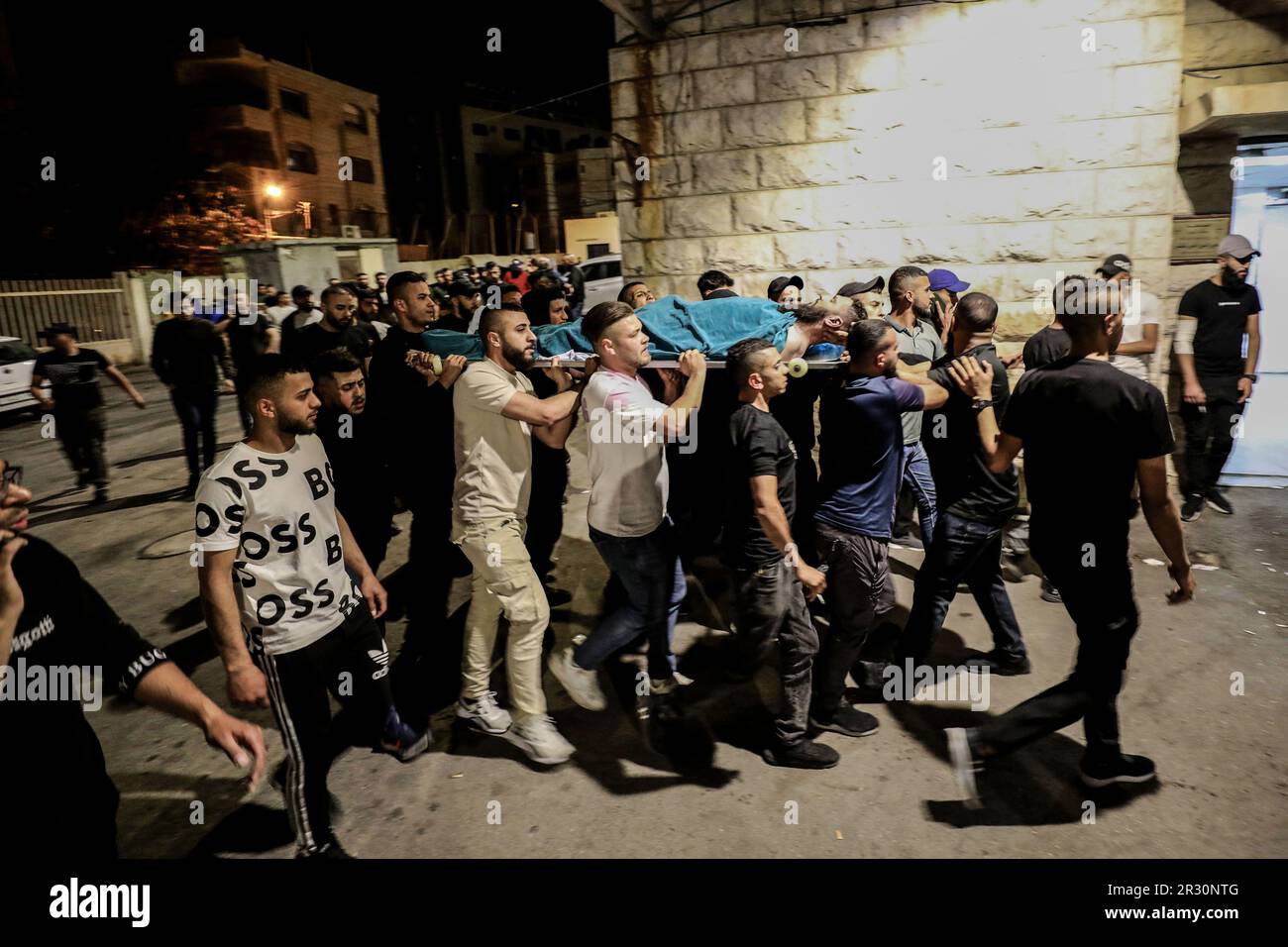 Nablus, Palestinian Territories. 22nd May, 2023. Palestinians carry the ...
