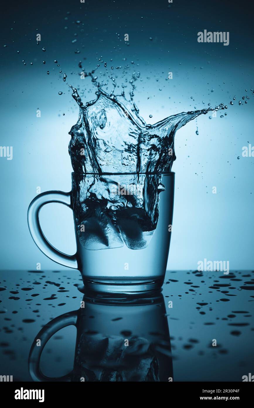 water splash in a glass Stock Photo - Alamy