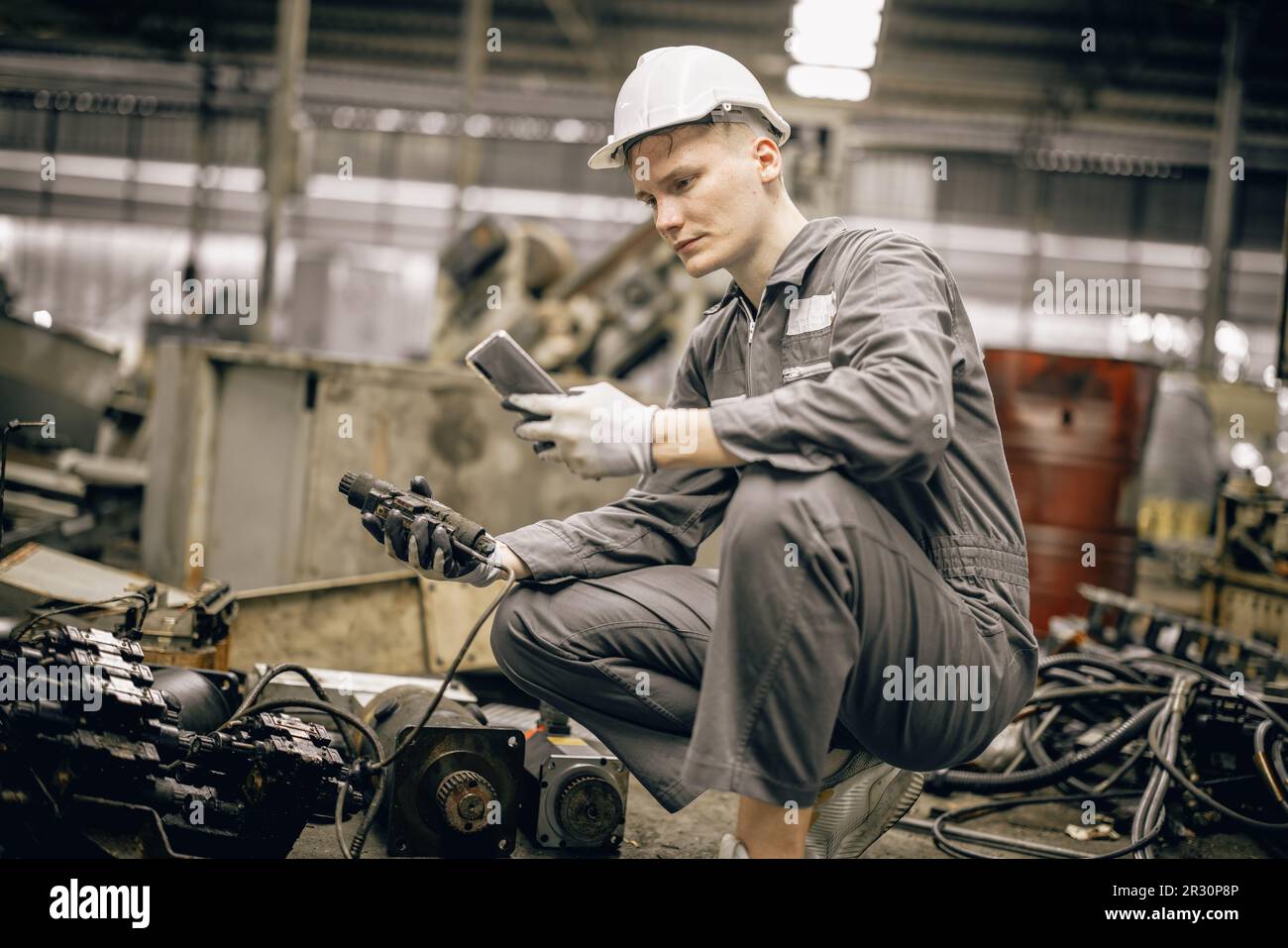 Engineering technicians use hand tools to perform regular maintenance ...