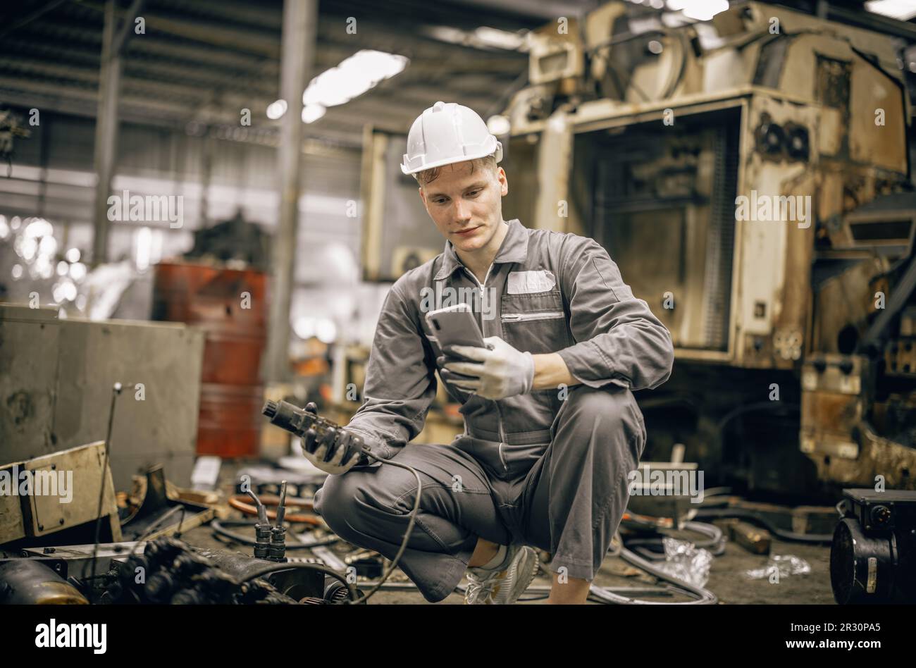 Engineering technicians use hand tools to perform regular maintenance ...