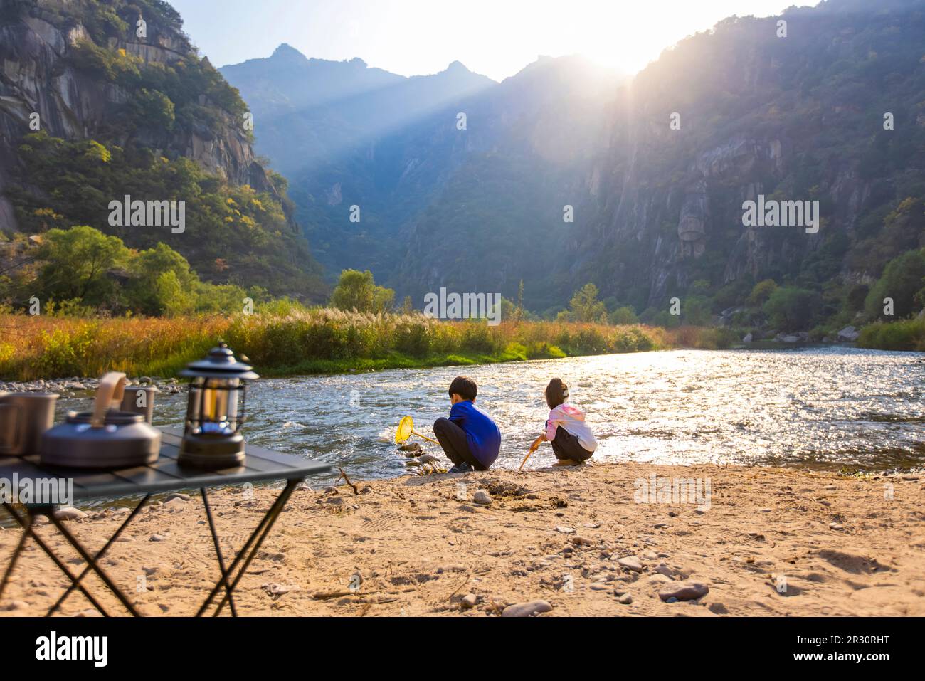 Cute Chinese Children having fun outdoors Stock Photo - Alamy