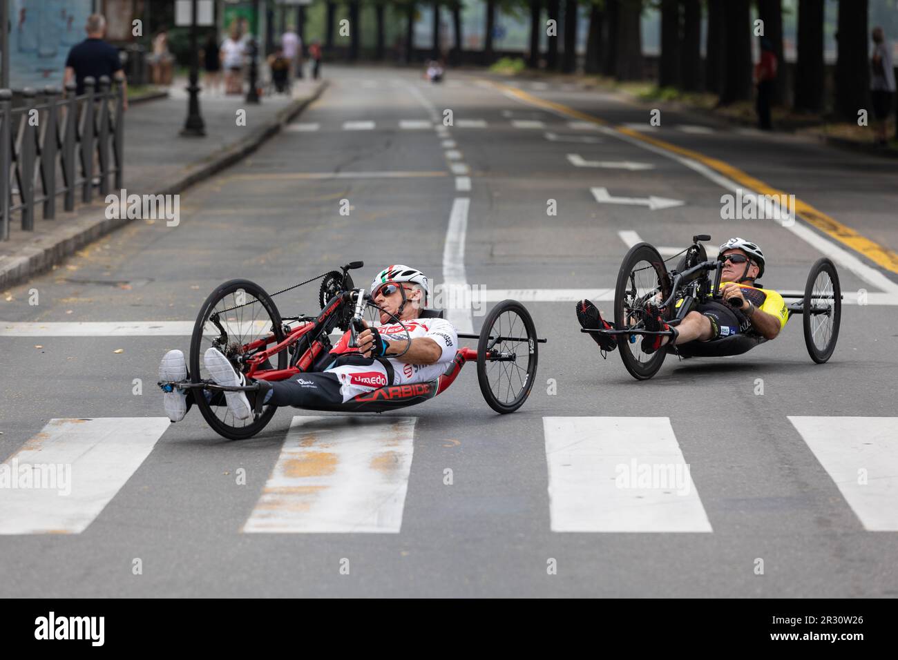 Couple of Athletes training with Their Special Bikes on a City Track ...