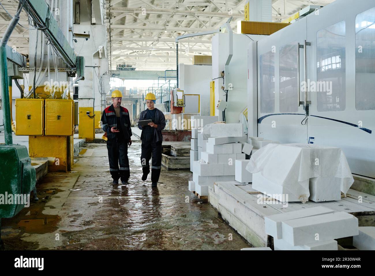 Engineers walking along plant hi-res stock photography and images - Alamy