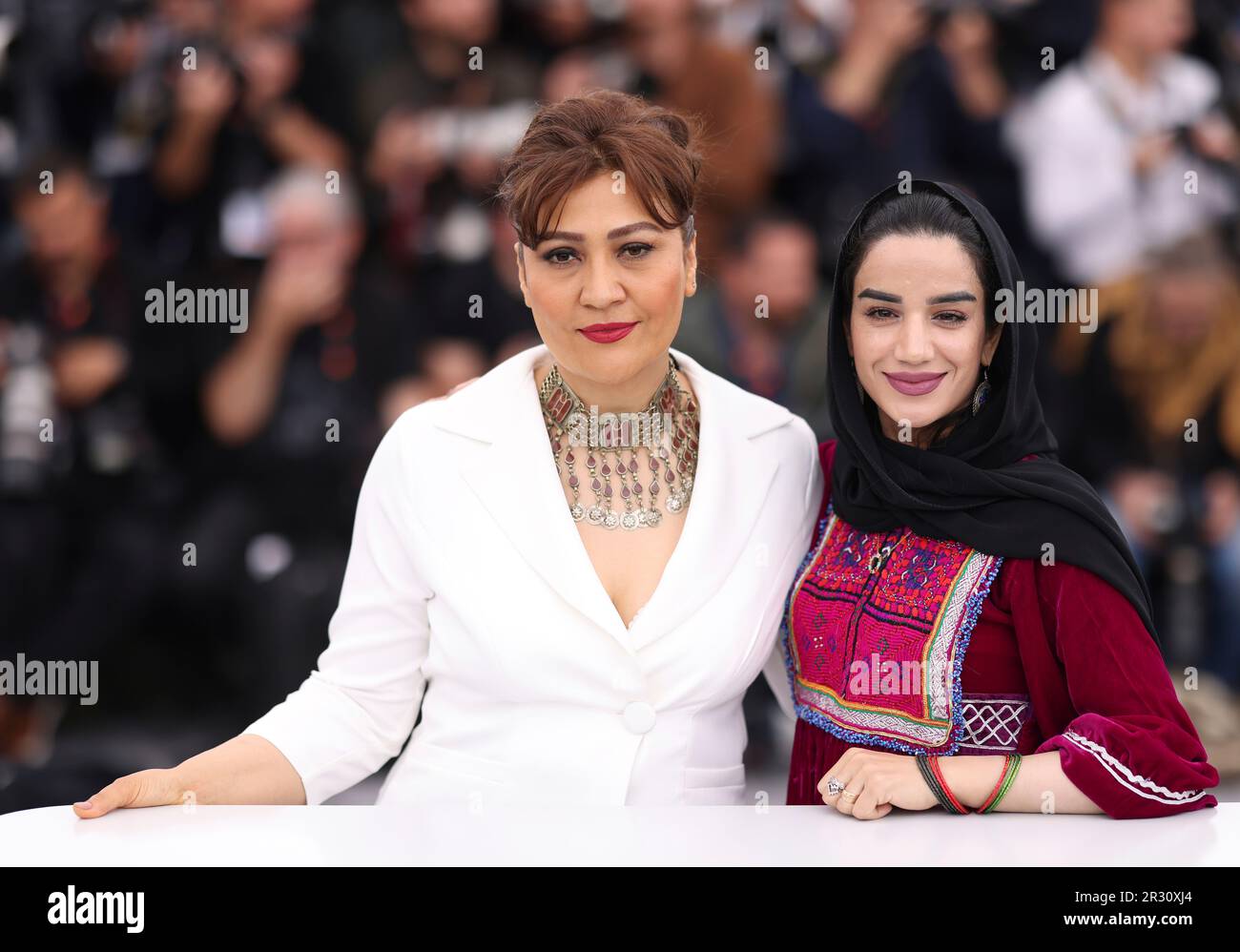 Director Sahra Mani, left, and Zahra pose for photographers at the ...