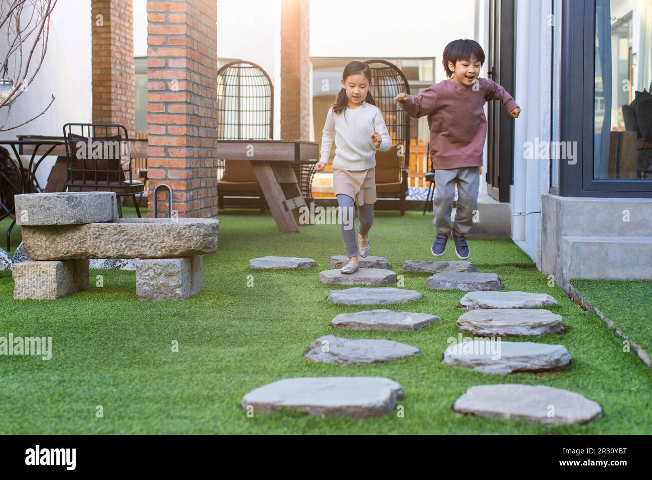Children playing in the courtyard hi-res stock photography and images ...
