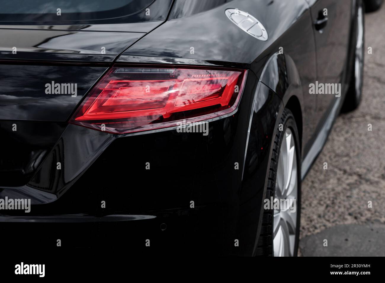 rear headlight of a sports car. luxury transport. back view Stock Photo ...