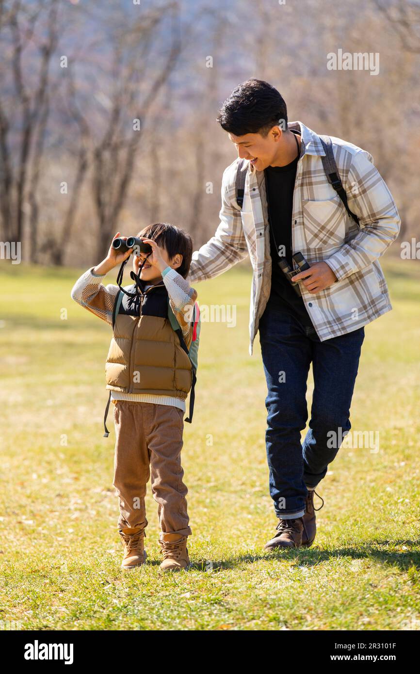 Little boy and his father hiking outdoors Stock Photo - Alamy
