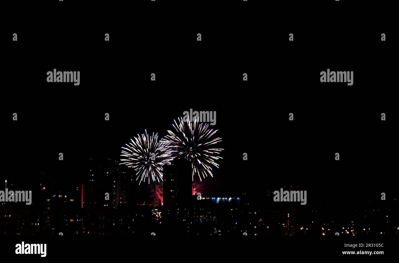 Fireworks on night city background. fireworks on sky Stock Photo - Alamy