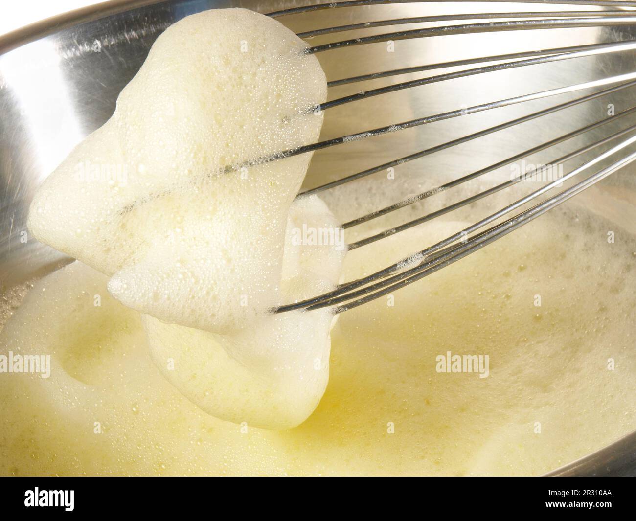 Zabaglione on a Whisk - Traditional Dessert isolated on white ...
