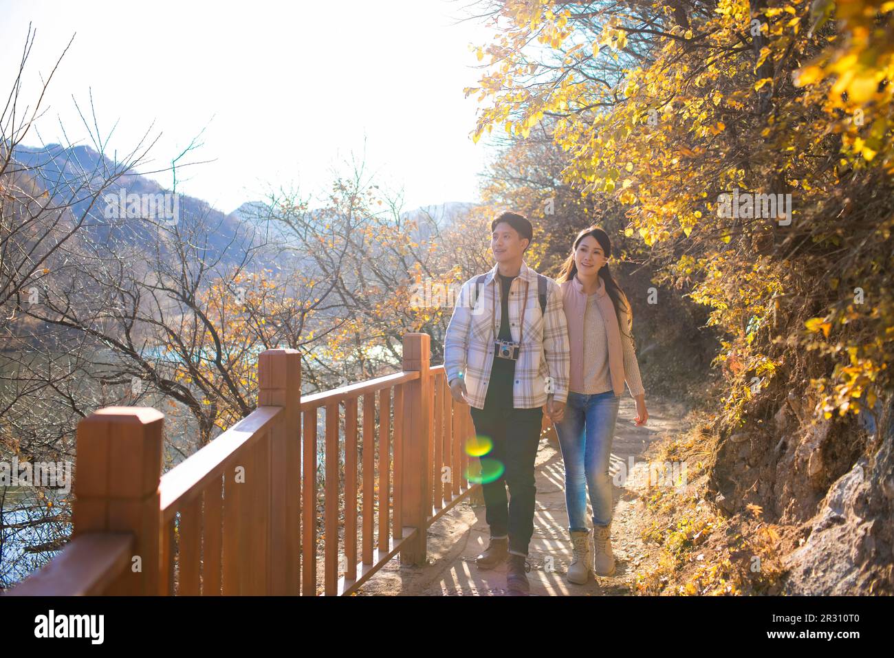 Young couple walking away scene nature scenery hi-res stock photography ...
