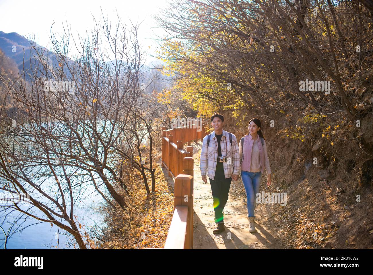 Young couple walking away scene nature scenery hi-res stock photography ...
