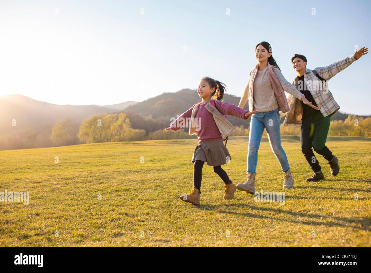 Child running away from parent hi-res stock photography and images - Alamy