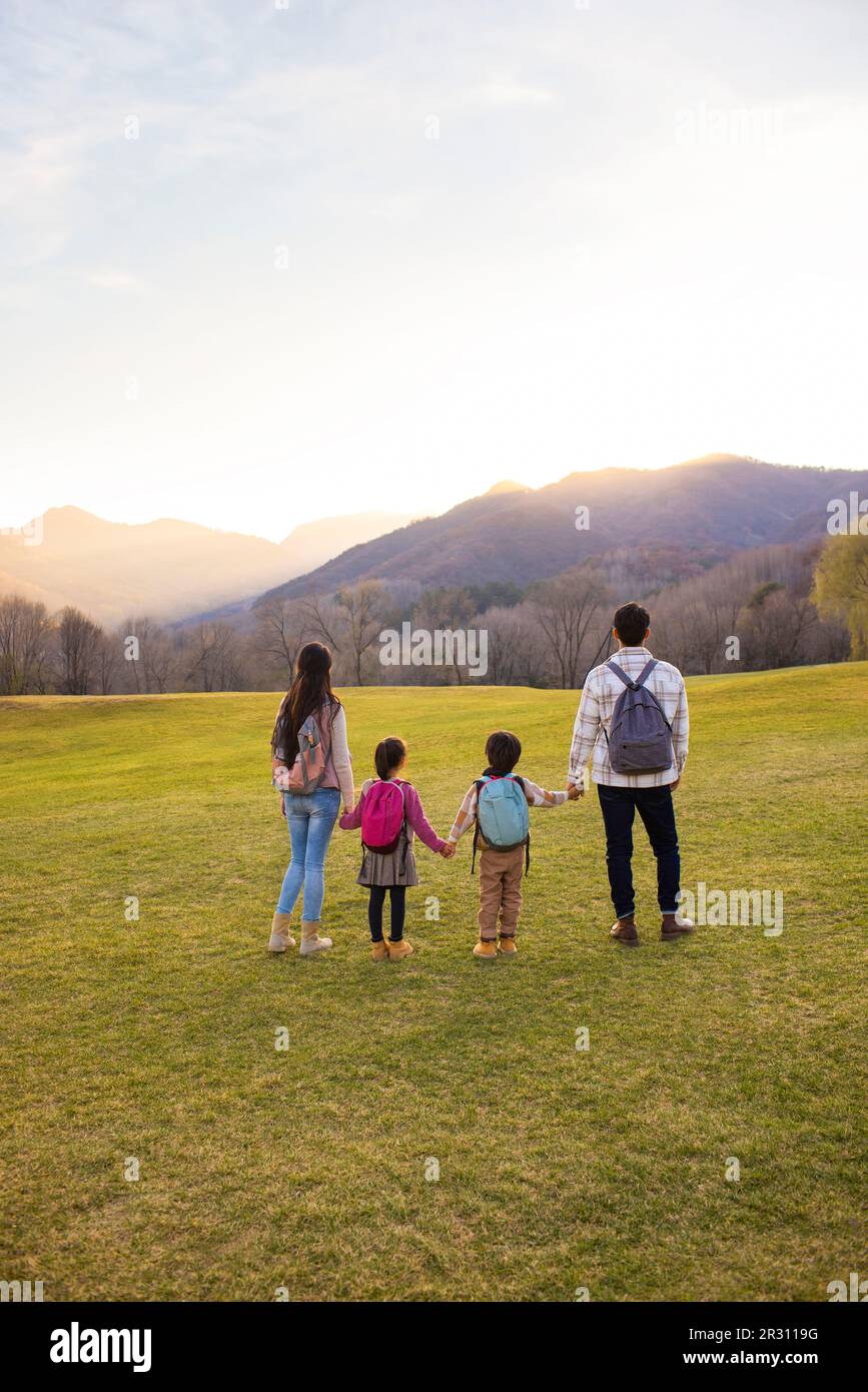 Cheerful young family enjoying the beautiful natural scenery Stock ...