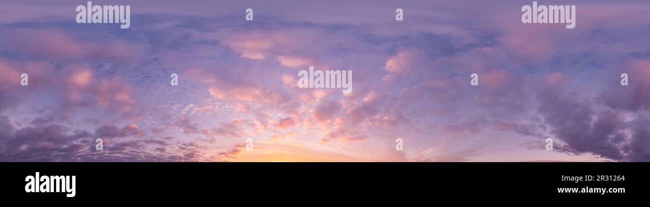 Sunset sky panorama with bright glowing pink Cumulus clouds. HDR 360 ...