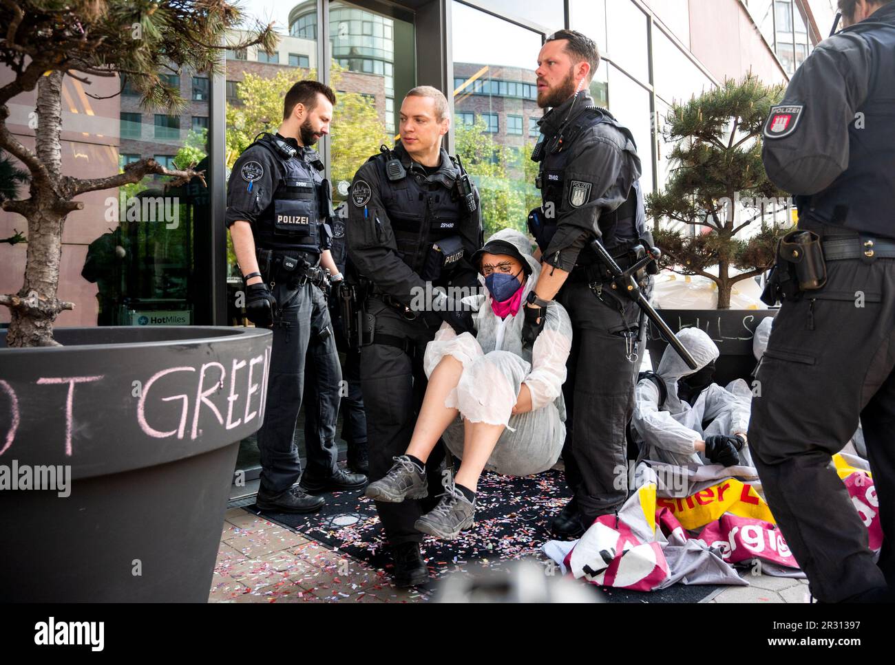 Hamburg, Germany. 22nd May, 2023. A climate activist from the group ...
