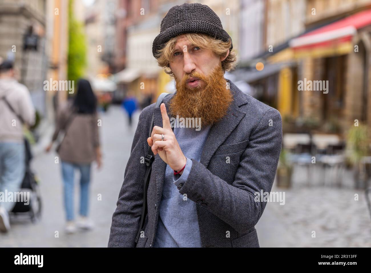 Displeased upset young bearded man reacting to unpleasant awful idea ...
