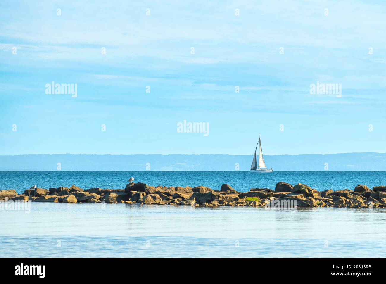Sailing yacht at the horizon of Kattegat sea close to the town of ...