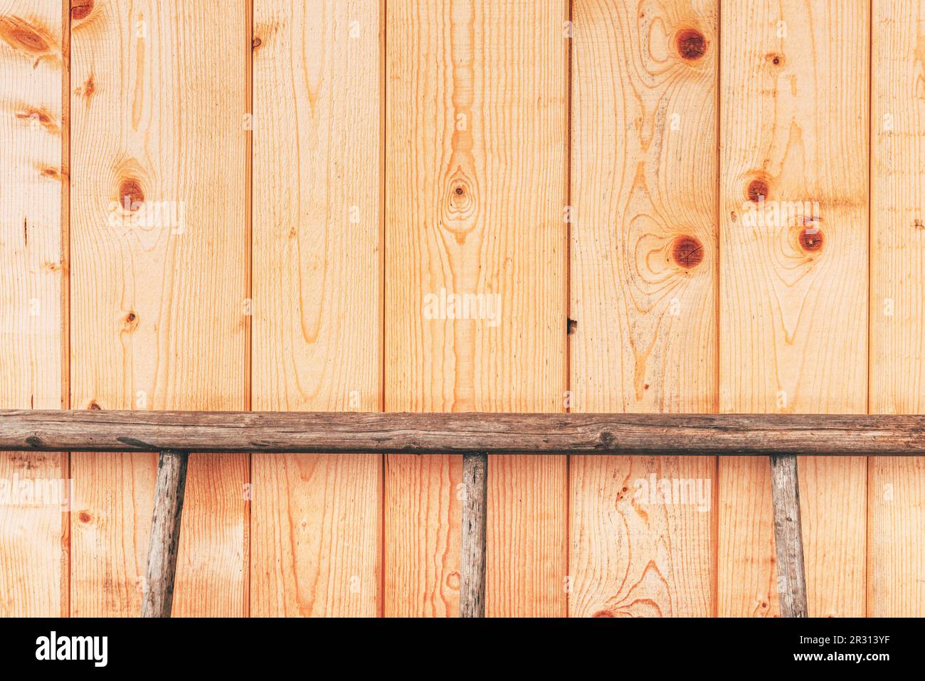 Pinewood wall and wooden ladders as abstract background and texture ...
