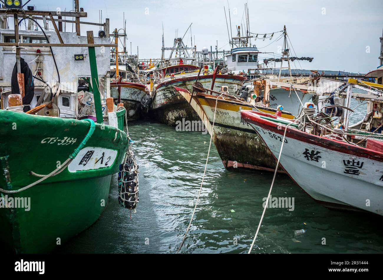 Taipei. 22nd May, 2023. Fishing vessels moored at wharf of Tamsui ...