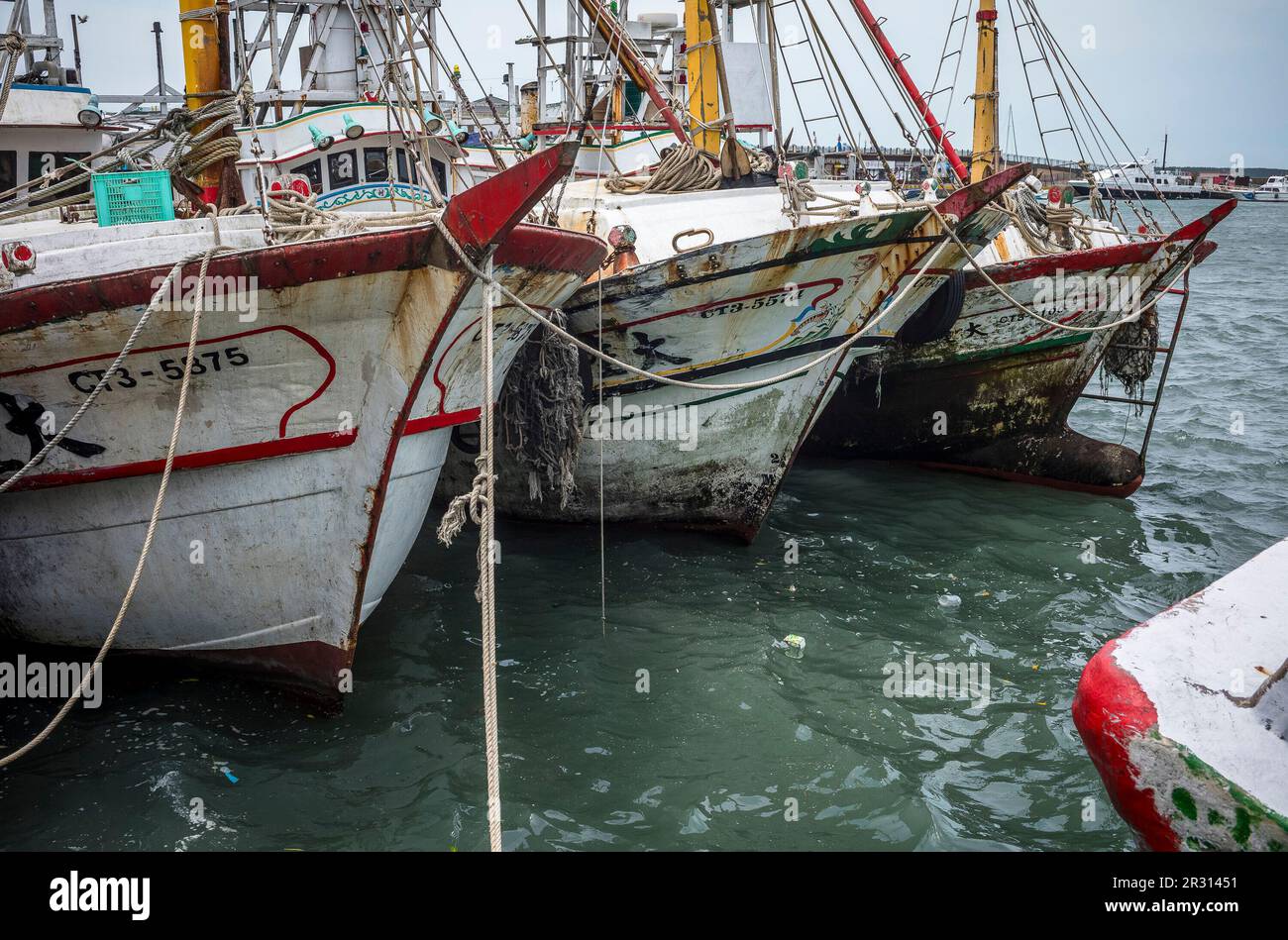 Taipei. 22nd May, 2023. Fishing vessels moored at wharf of Tamsui ...