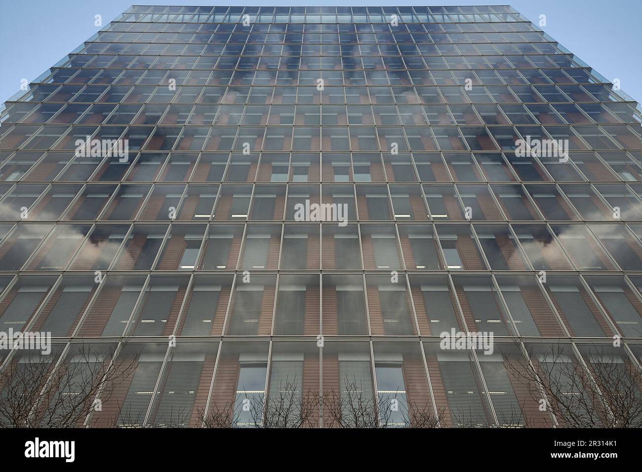 Reflective glass windows on the facade of a modern office building ...