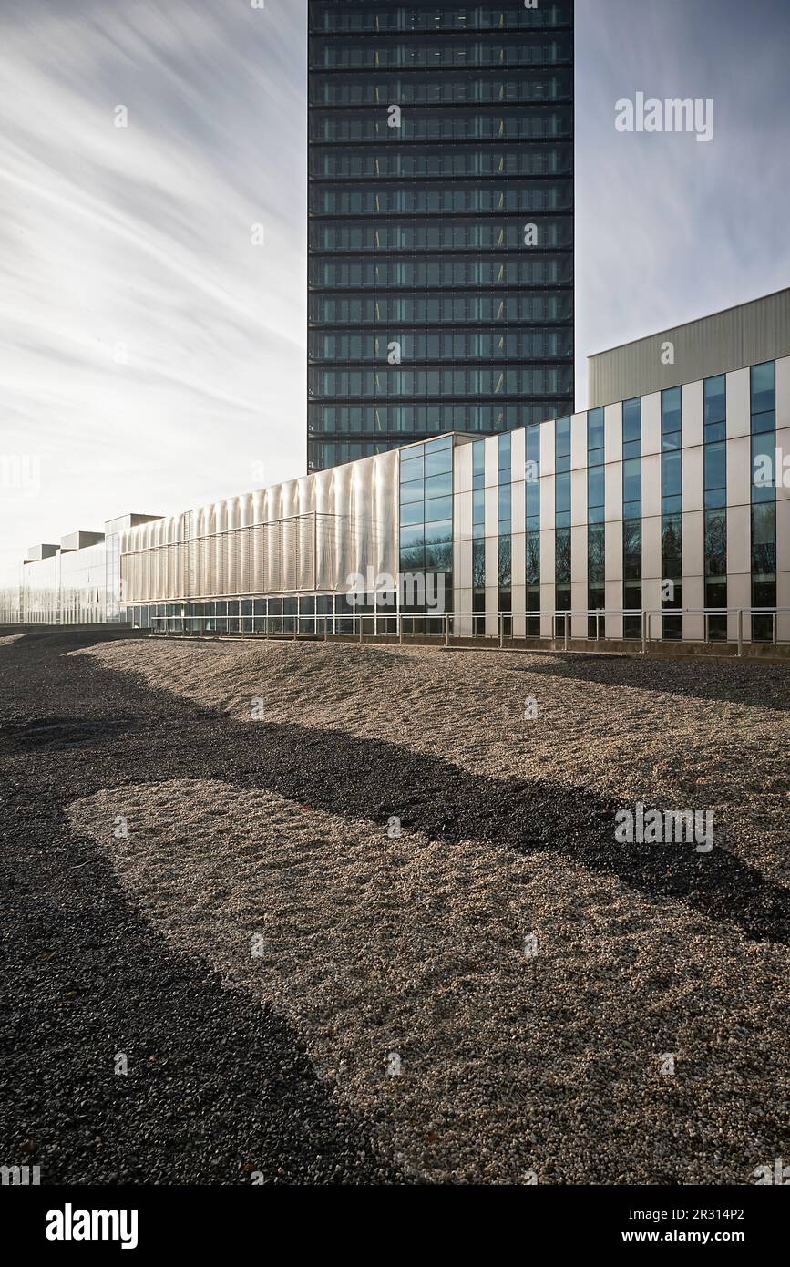 Futuristic modern office tower in bright sunshine Stock Photo - Alamy