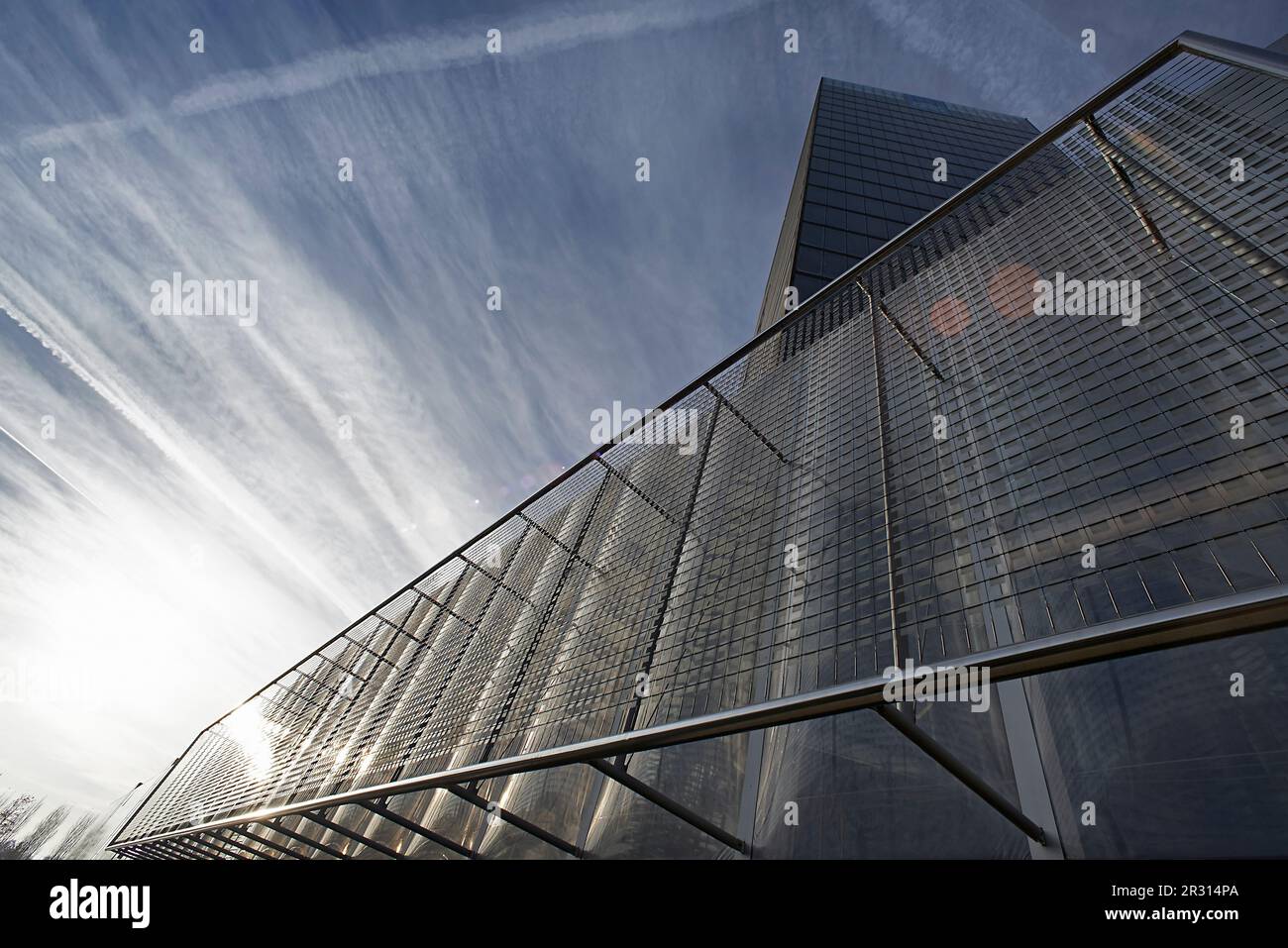 Futuristic modern office tower in bright sunshine Stock Photo - Alamy