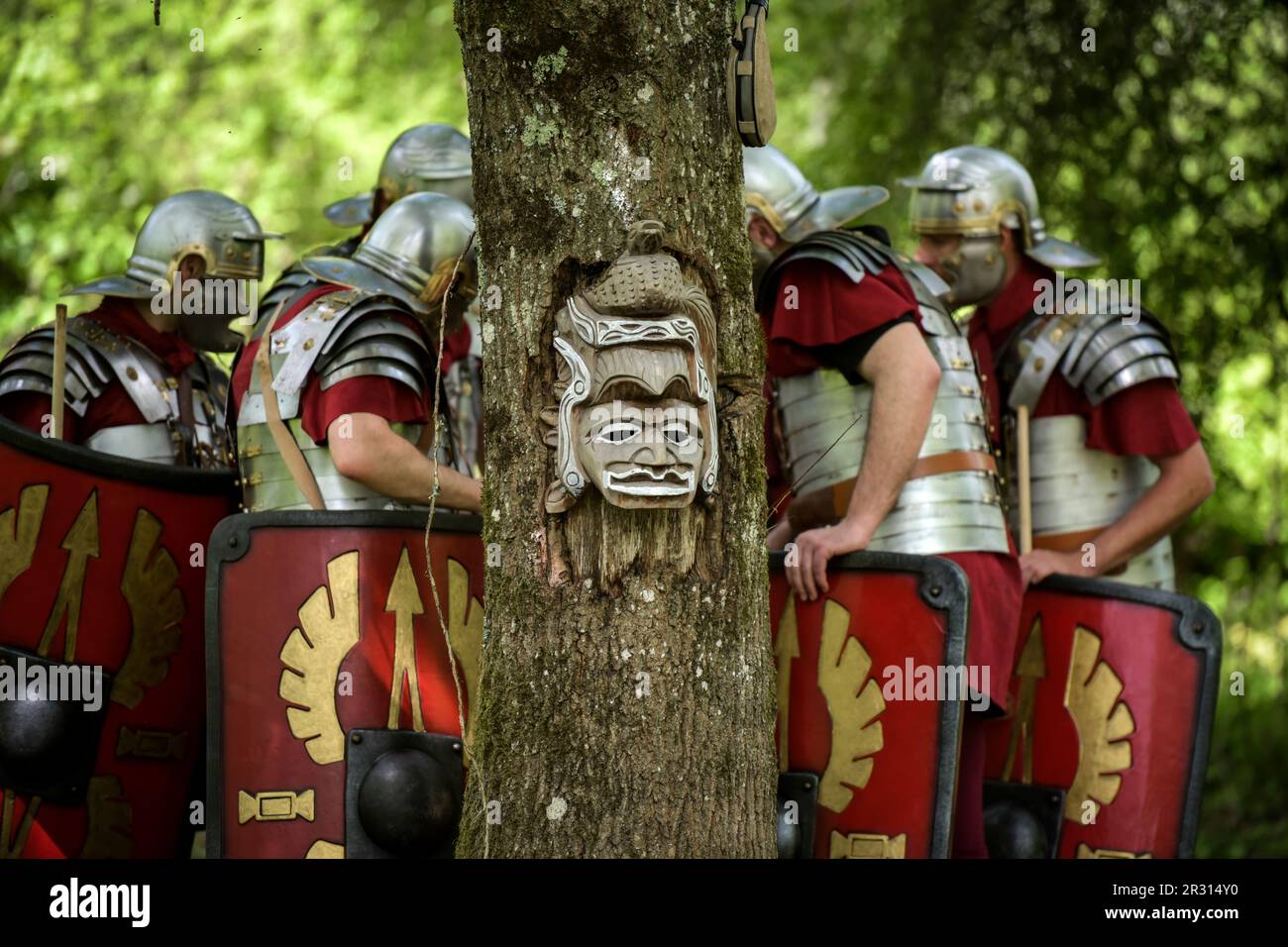 view of a medieval role-playing game in the forest in France Stock ...