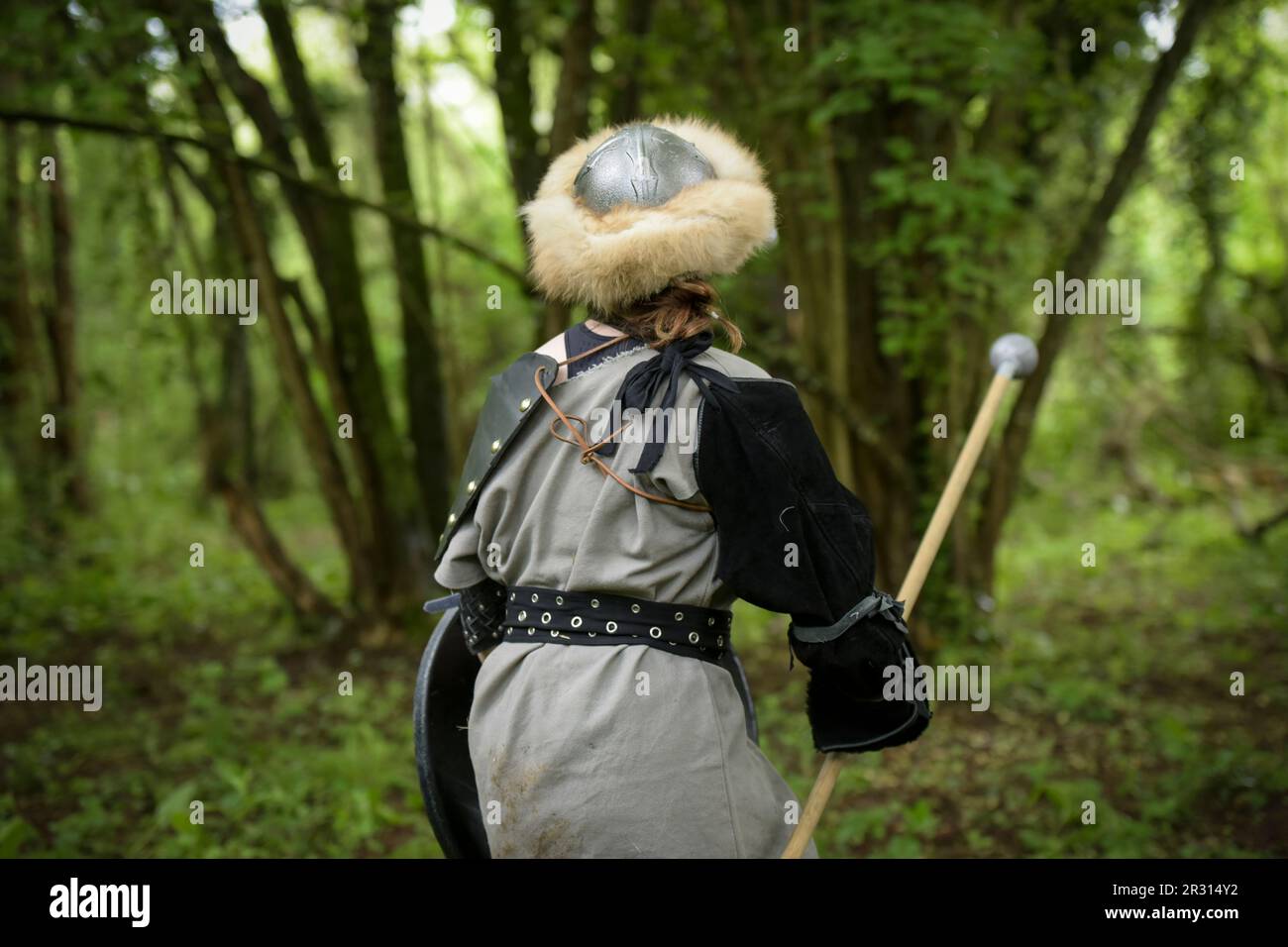 view of a medieval role-playing game in the forest in France Stock ...