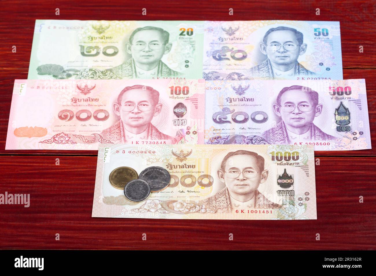 Thai money - baht - coins and banknotes Stock Photo - Alamy