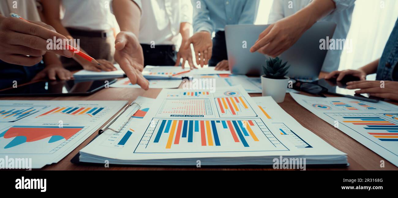 Focus panorama shot of chart and graph paper with blur analyst team ...