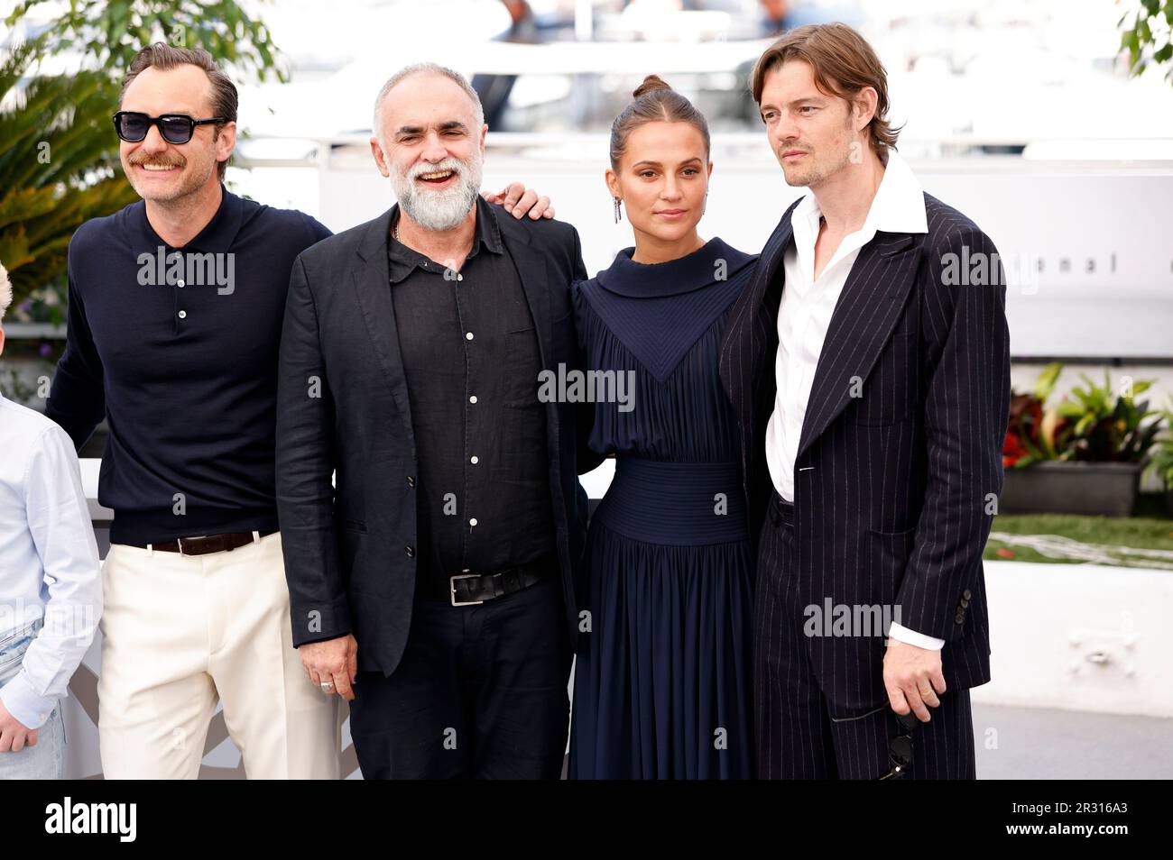 Cannes, France. 22nd May, 2023. Jude Law, Karim Ainouz, Alicia Vikander ...