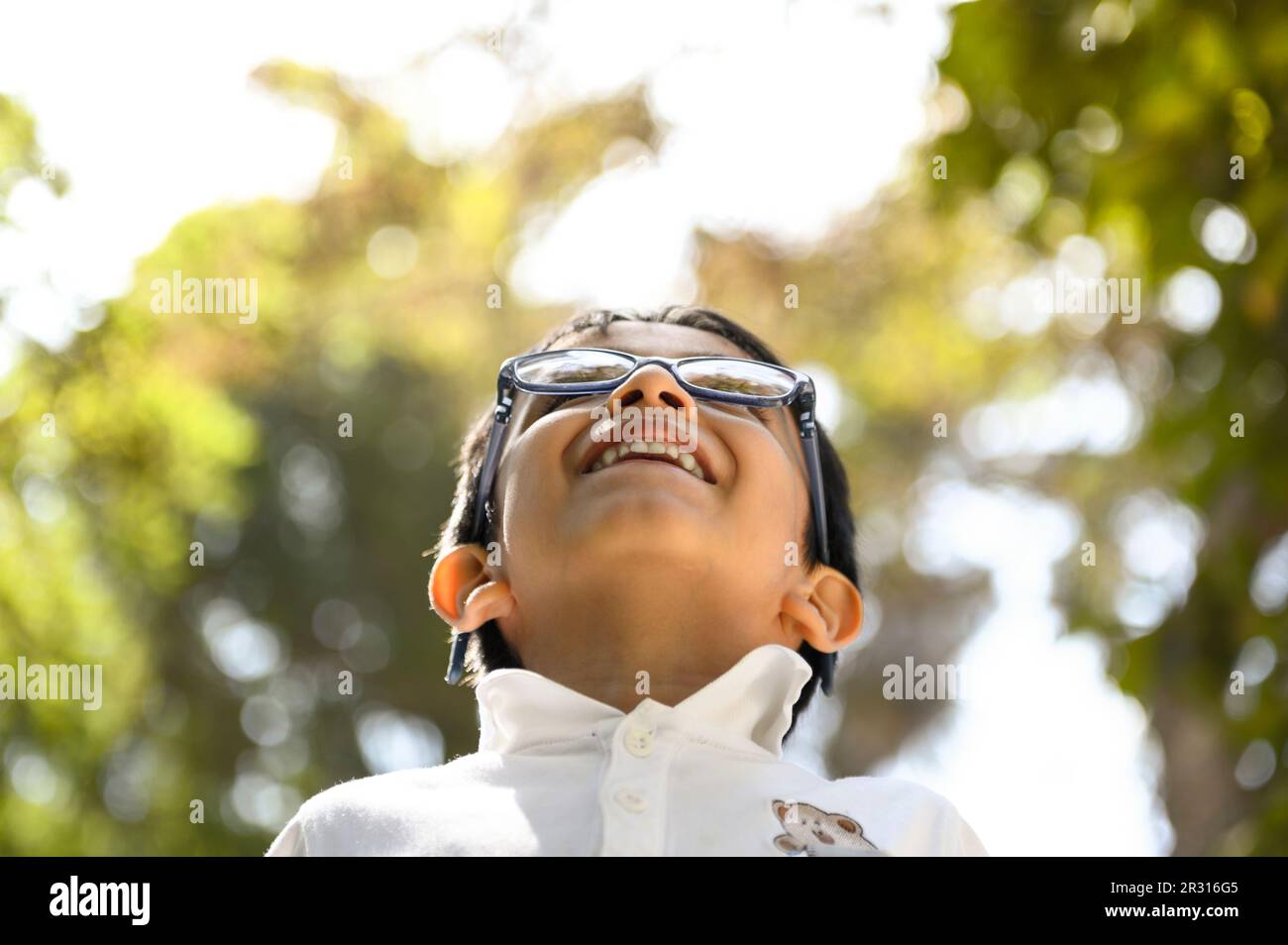 Child in contact with nature Stock Photo - Alamy