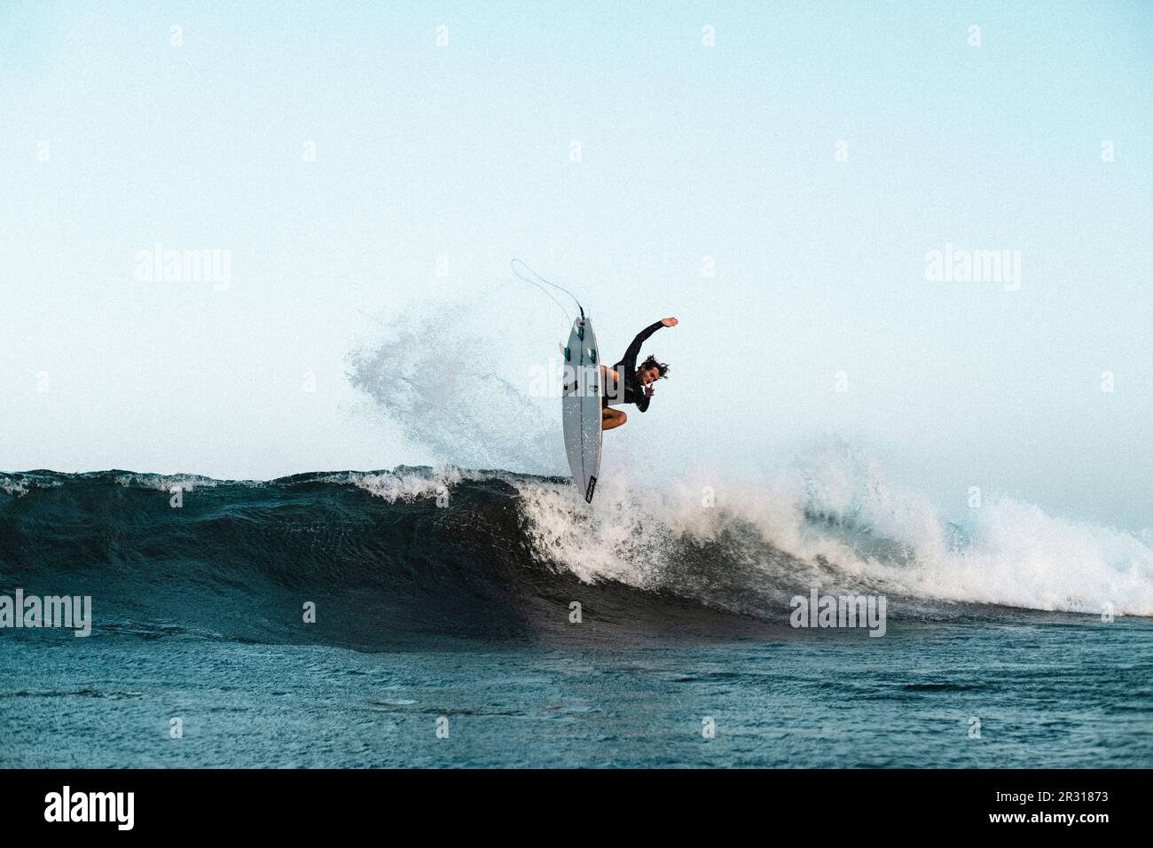 Pulled back of brazilian pro surfer Vicente Romero doing an aerial ...