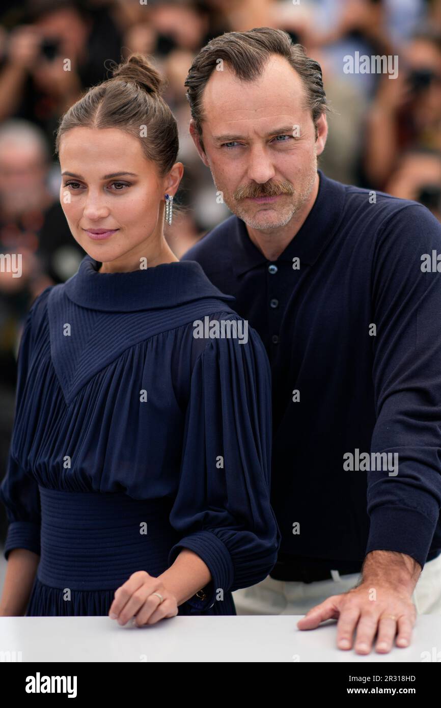 Alicia Vikander, left, and Jude Law pose for photographers at the photo ...