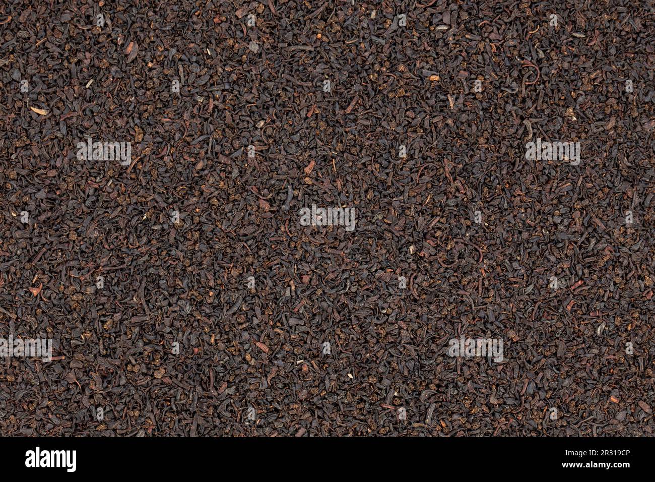 Black tea background. Top view. Dry black tea leaves Stock Photo - Alamy