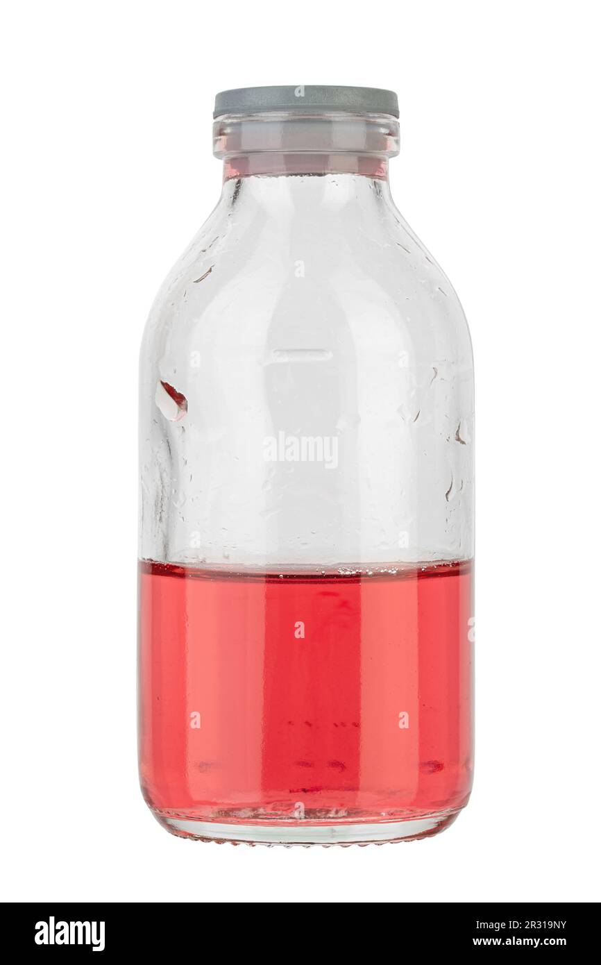 Started bottle with red syrup, medical drug. Isolated on white ...