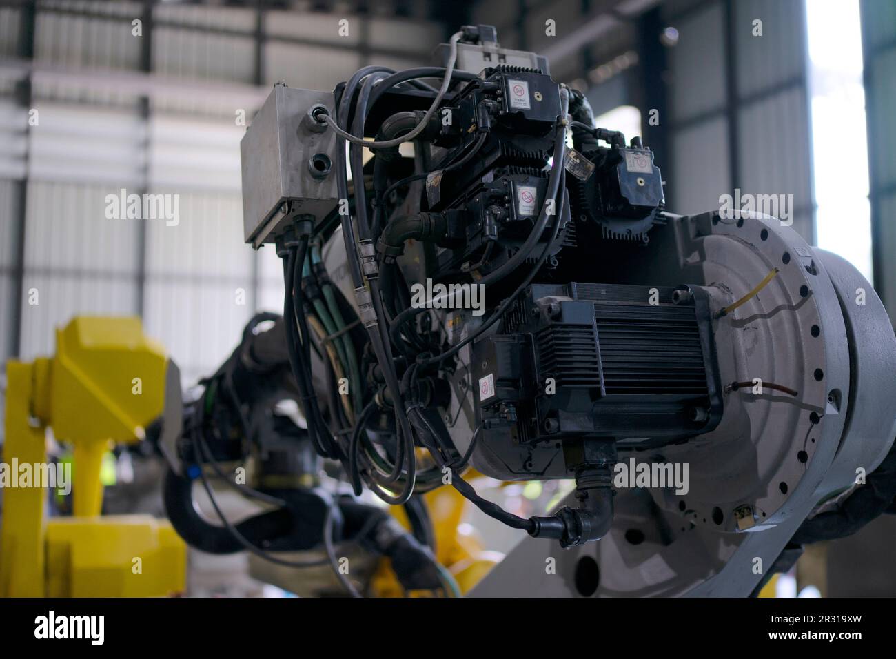 Engineer work at robotic arm factory. Technology and engineering concept Stock Photo - Alamy